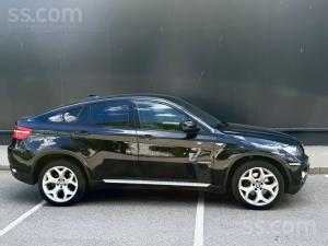 Black BMW X6 2009 in Riga, with an engine capacity of 3.00 L and mileage of 366 thousand km for 11498 €, photo 3 on AUTOMOTO.COM.LV