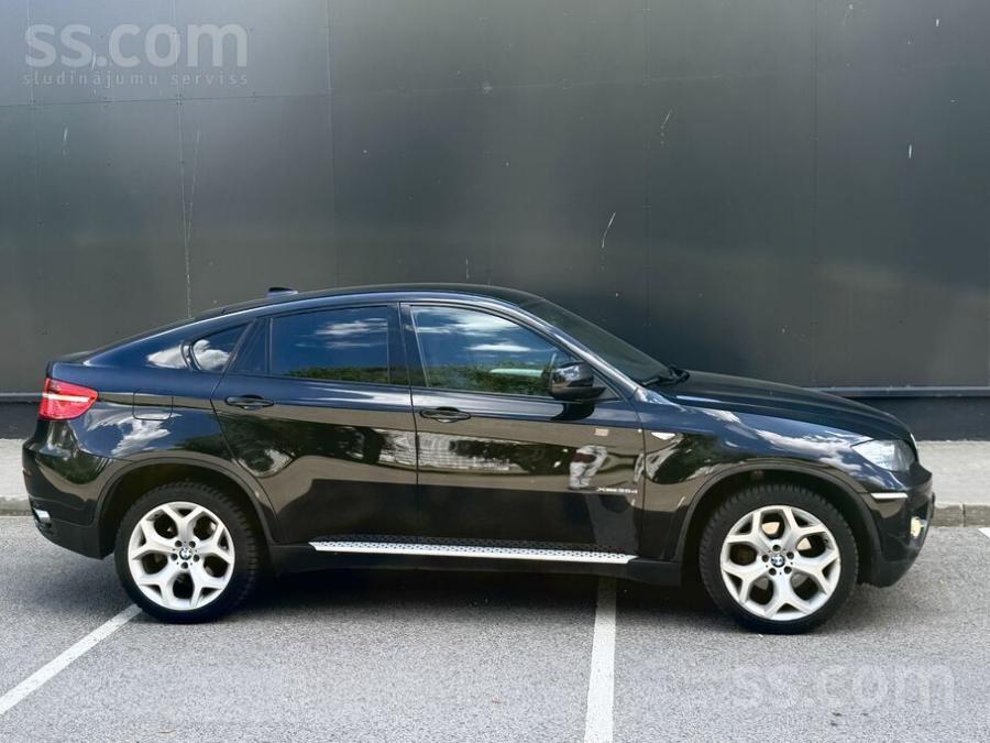 Black BMW X6 2009 in Riga, with an engine capacity of 3.00 L and mileage of 366 thousand km for 11498 €, photo 3 on AUTOMOTO.COM.LV