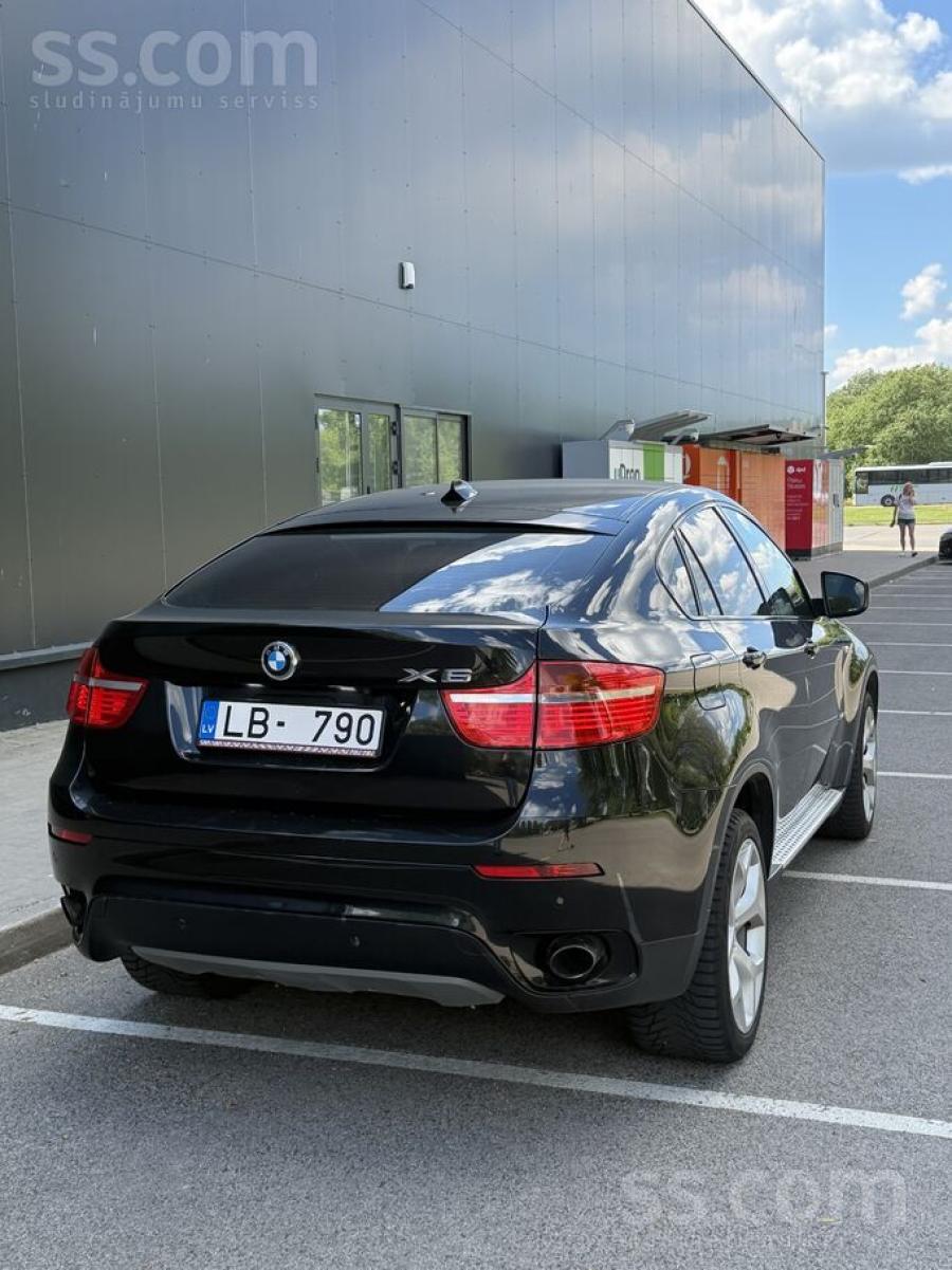 Black BMW X6 2009 in Riga, with an engine capacity of 3.00 L and mileage of 366 thousand km for 11498 €, photo 4 on AUTOMOTO.COM.LV