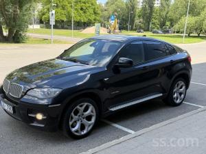 Black BMW X6 2009 in Riga, with an engine capacity of 3.00 L and mileage of 366 thousand km for 11498 €, photo 6 on AUTOMOTO.COM.LV