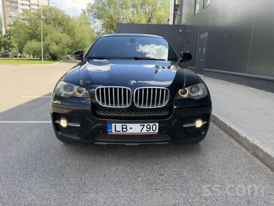 Black BMW X6 2009 in Riga, with an engine capacity of 3.00 L and mileage of 366 thousand km for 11498 €, photo 7 on AUTOMOTO.COM.LV