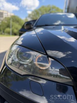 Black BMW X6 2009 in Riga, with an engine capacity of 3.00 L and mileage of 366 thousand km for 11498 €, photo 8 on AUTOMOTO.COM.LV