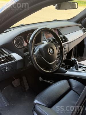 Black BMW X6 2009 in Riga, with an engine capacity of 3.00 L and mileage of 366 thousand km for 11498 €, photo 12 on AUTOMOTO.COM.LV