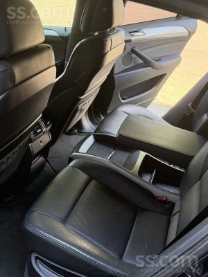 Black BMW X6 2009 in Riga, with an engine capacity of 3.00 L and mileage of 366 thousand km for 11498 €, photo 16 on AUTOMOTO.COM.LV