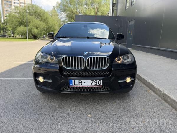 Black BMW X6 2009 in Riga, with an engine capacity of 3.00 L and mileage of 366 thousand km for 10999 €, photo 6 on AUTOMOTO.COM.LV