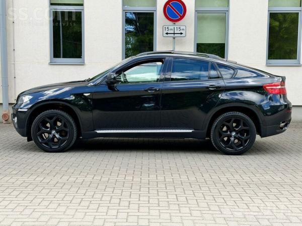 Black BMW X6 2009 in Jelgava, with an engine capacity of 3.00 L and mileage of 301 thousand km for 9900 €, photo 7 on AUTOMOTO.COM.LV