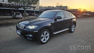 Black BMW X6 2009 in Riga, with an engine capacity of 3.00 L and mileage of 522 thousand km for 8600 €, photo 5 on AUTOMOTO.COM.LV