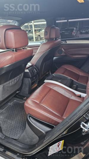 Black BMW X6 2009 in Riga, with an engine capacity of 3.00 L and mileage of 522 thousand km for 8600 €, photo 10 on AUTOMOTO.COM.LV
