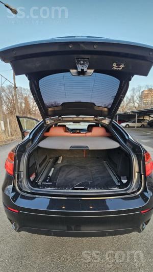 Black BMW X6 2009 in Riga, with an engine capacity of 3.00 L and mileage of 522 thousand km for 8600 €, photo 11 on AUTOMOTO.COM.LV