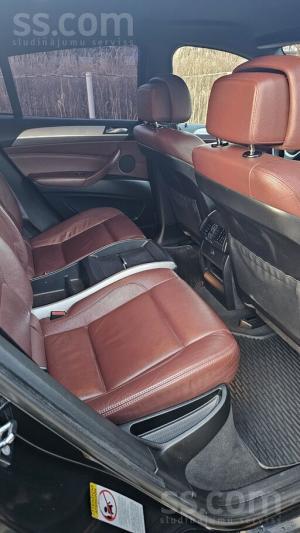 Black BMW X6 2009 in Riga, with an engine capacity of 3.00 L and mileage of 522 thousand km for 8600 €, photo 12 on AUTOMOTO.COM.LV