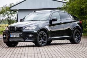 Black BMW X6 2009 in Riga, with an engine capacity of 3.00 L and mileage of 319 thousand km for 11490 €, photo  on AUTOMOTO.COM.LV