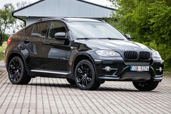 Black BMW X6 2009 in Riga, with an engine capacity of 3.00 L and mileage of 319 thousand km for 11490 €, photo 4 on AUTOMOTO.COM.LV