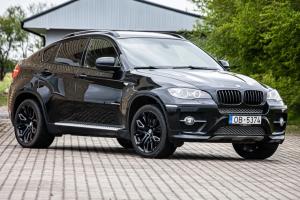 Black BMW X6 2009 in Riga, with an engine capacity of 3.00 L and mileage of 319 thousand km for 11490 €, photo 5 on AUTOMOTO.COM.LV