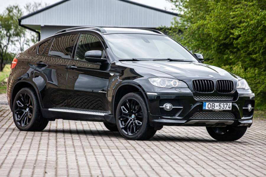 Black BMW X6 2009 in Riga, with an engine capacity of 3.00 L and mileage of 319 thousand km for 11490 €, photo 5 on AUTOMOTO.COM.LV