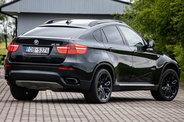 Black BMW X6 2009 in Riga, with an engine capacity of 3.00 L and mileage of 319 thousand km for 11490 €, photo 6 on AUTOMOTO.COM.LV