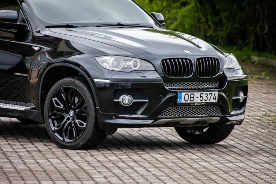 Black BMW X6 2009 in Riga, with an engine capacity of 3.00 L and mileage of 319 thousand km for 11490 €, photo 8 on AUTOMOTO.COM.LV