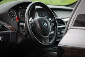 Black BMW X6 2009 in Riga, with an engine capacity of 3.00 L and mileage of 319 thousand km for 11490 €, photo 20 on AUTOMOTO.COM.LV