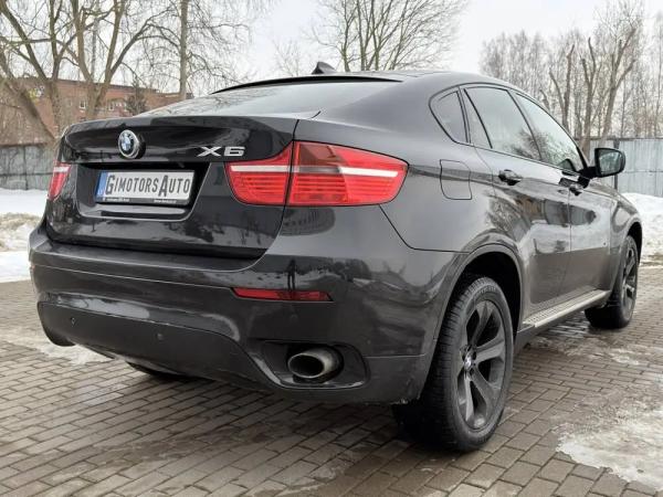 Black BMW X6 2009 in Riga, with an engine capacity of 3.00 L and mileage of 336 thousand km for 9900 €, photo 4 on AUTOMOTO.COM.LV