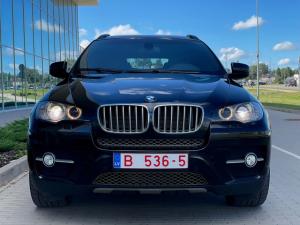 Black BMW X6 2009 in Riga, with an engine capacity of 3.00 L and mileage of 390 thousand km for 12490 €, photo 4 on AUTOMOTO.COM.LV