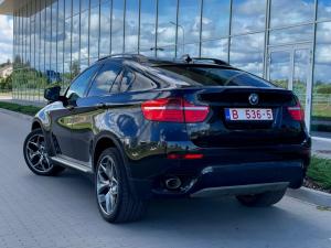 Black BMW X6 2009 in Riga, with an engine capacity of 3.00 L and mileage of 390 thousand km for 12490 €, photo 5 on AUTOMOTO.COM.LV