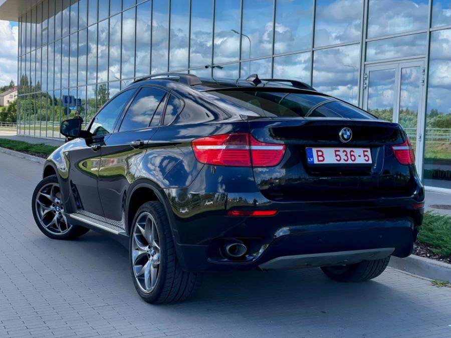 Black BMW X6 2009 in Riga, with an engine capacity of 3.00 L and mileage of 390 thousand km for 12490 €, photo 5 on AUTOMOTO.COM.LV