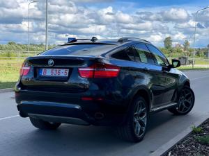 Black BMW X6 2009 in Riga, with an engine capacity of 3.00 L and mileage of 390 thousand km for 12490 €, photo 6 on AUTOMOTO.COM.LV