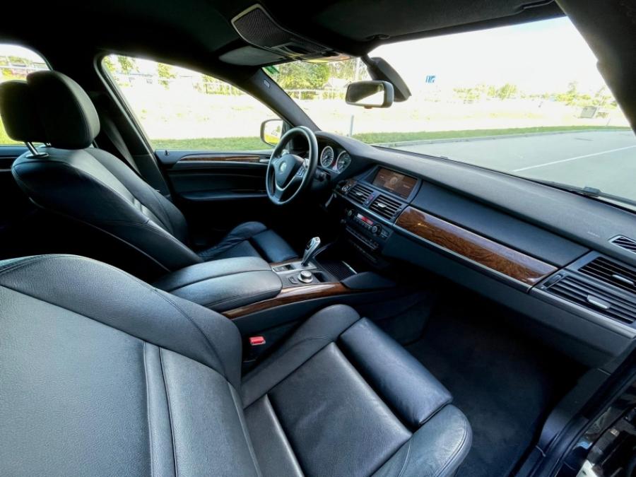 Black BMW X6 2009 in Riga, with an engine capacity of 3.00 L and mileage of 390 thousand km for 12490 €, photo 12 on AUTOMOTO.COM.LV