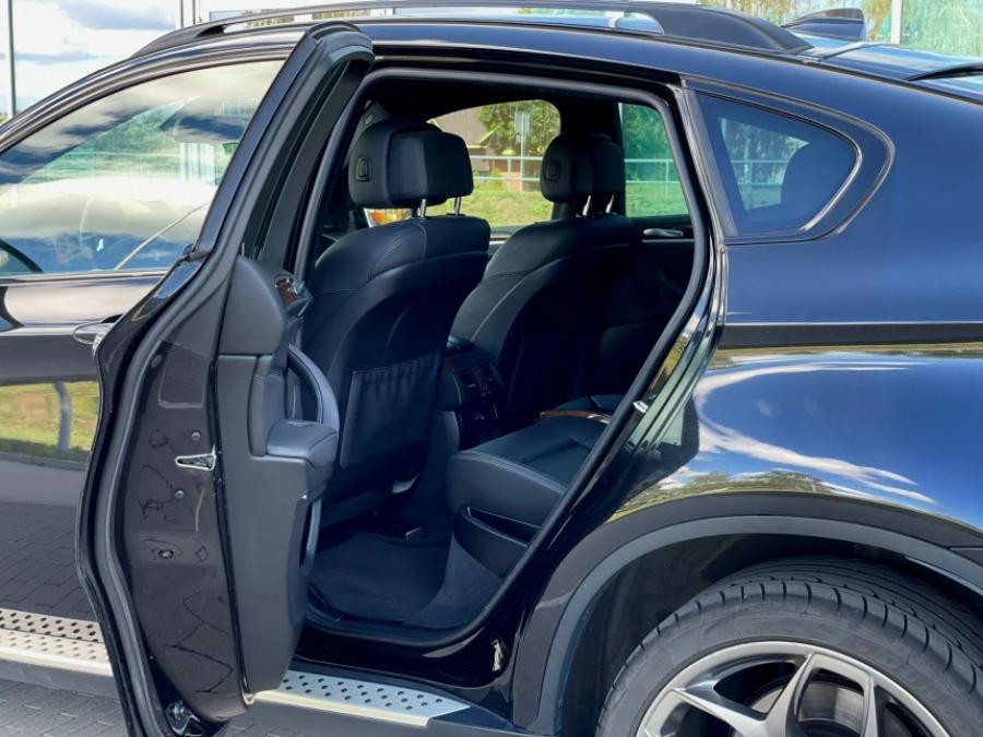 Black BMW X6 2009 in Riga, with an engine capacity of 3.00 L and mileage of 390 thousand km for 12490 €, photo 14 on AUTOMOTO.COM.LV