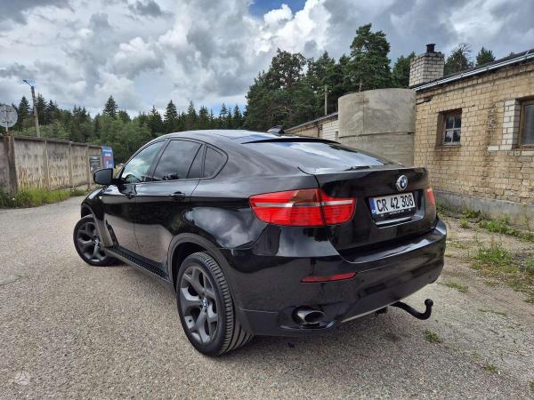Black BMW X6 2009 in Utena, with an engine capacity of 2.98 L and mileage of 181 thousand km for 10490 €, photo 3 on AUTOMOTO.COM.LV