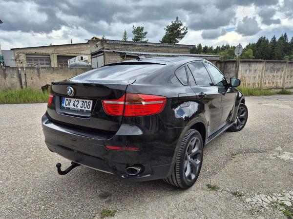 Black BMW X6 2009 in Utena, with an engine capacity of 2.98 L and mileage of 181 thousand km for 10490 €, photo 4 on AUTOMOTO.COM.LV