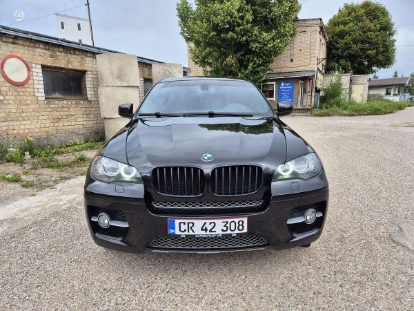 Black BMW X6 2009 in Utena, with an engine capacity of 2.98 L and mileage of 181 thousand km for 10490 €, photo 9 on AUTOMOTO.COM.LV