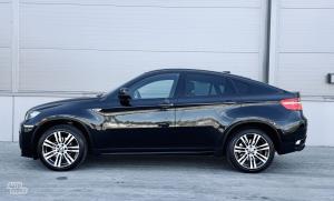 Black BMW X6 2009 in Kaunas, with an engine capacity of 3.00 L and mileage of 283 thousand km for 12100 €, photo 7 on AUTOMOTO.COM.LV