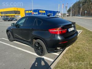 Black BMW X6 2010 in Riga, with an engine capacity of 3.00 L and mileage of 290 thousand km for 10850 €, photo 4 on AUTOMOTO.COM.LV