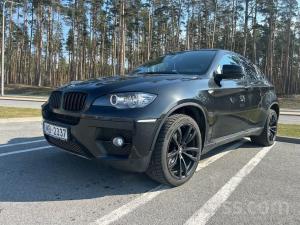 Black BMW X6 2010 in Riga, with an engine capacity of 3.00 L and mileage of 290 thousand km for 10850 €, photo 5 on AUTOMOTO.COM.LV