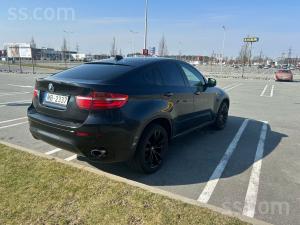 Black BMW X6 2010 in Riga, with an engine capacity of 3.00 L and mileage of 290 thousand km for 10850 €, photo 6 on AUTOMOTO.COM.LV