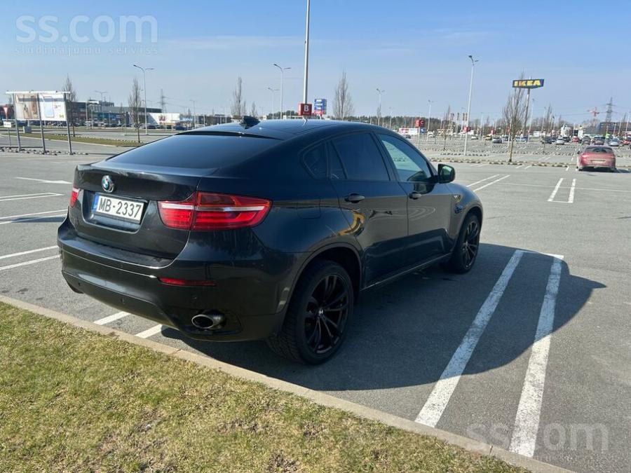 Black BMW X6 2010 in Riga, with an engine capacity of 3.00 L and mileage of 290 thousand km for 10850 €, photo 6 on AUTOMOTO.COM.LV