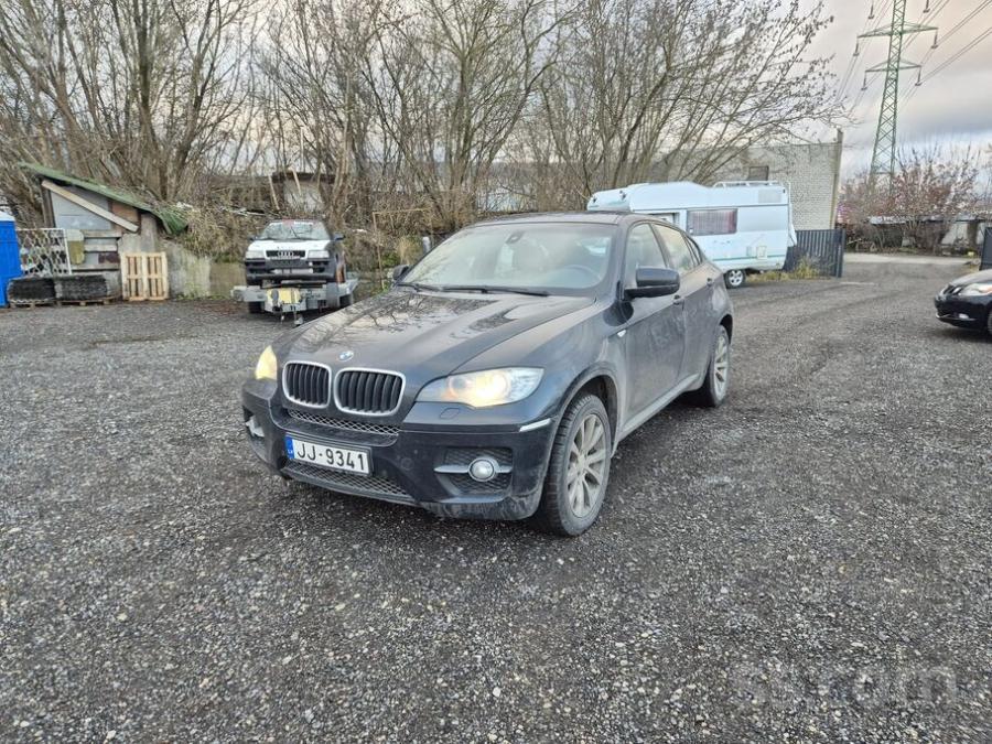Black BMW X6 2010 in Riga, with an engine capacity of 3.00 L and mileage of 228 thousand km for 14590 €, photo 1 on AUTOMOTO.COM.LV