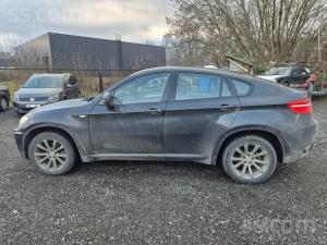 Black BMW X6 2010 in Riga, with an engine capacity of 3.00 L and mileage of 228 thousand km for 14590 €, photo 9 on AUTOMOTO.COM.LV