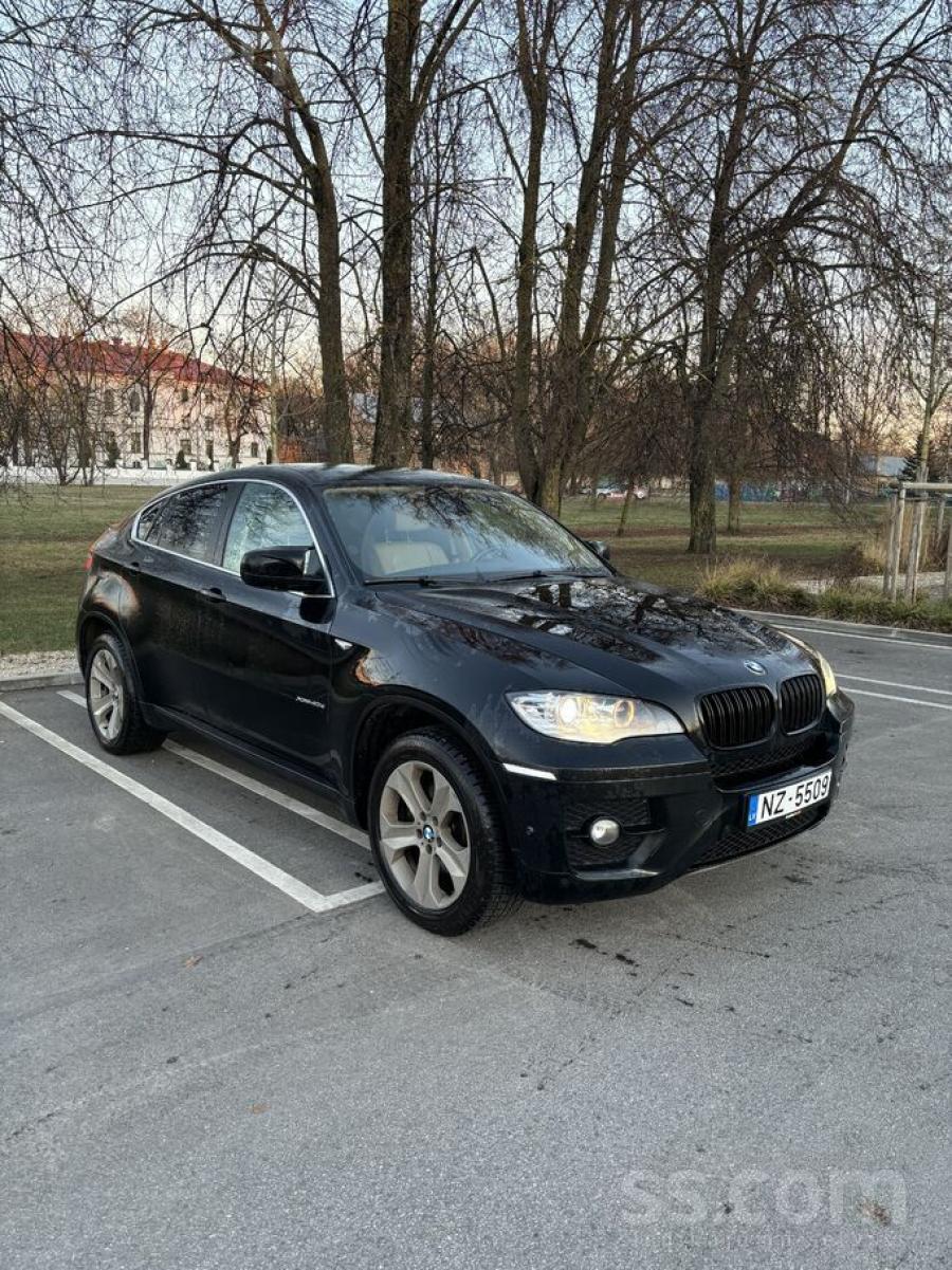 Black BMW X6 2010 in Riga, with an engine capacity of 3.00 L and mileage of 256 thousand km for 11700 €, photo 1 on AUTOMOTO.COM.LV
