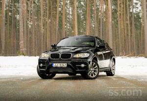 Black BMW X6 2010 in Riga, with an engine capacity of 3.00 L and mileage of 228 thousand km for 14190 €, photo  on AUTOMOTO.COM.LV