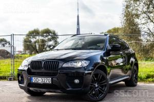 Black BMW X6 2010 in Riga, with an engine capacity of 3.00 L and mileage of 264 thousand km for 14990 €, photo  on AUTOMOTO.COM.LV