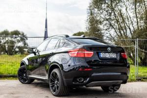 Black BMW X6 2010 in Riga, with an engine capacity of 3.00 L and mileage of 264 thousand km for 14990 €, photo 6 on AUTOMOTO.COM.LV