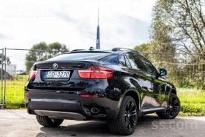 Black BMW X6 2010 in Riga, with an engine capacity of 3.00 L and mileage of 264 thousand km for 14990 €, photo 7 on AUTOMOTO.COM.LV