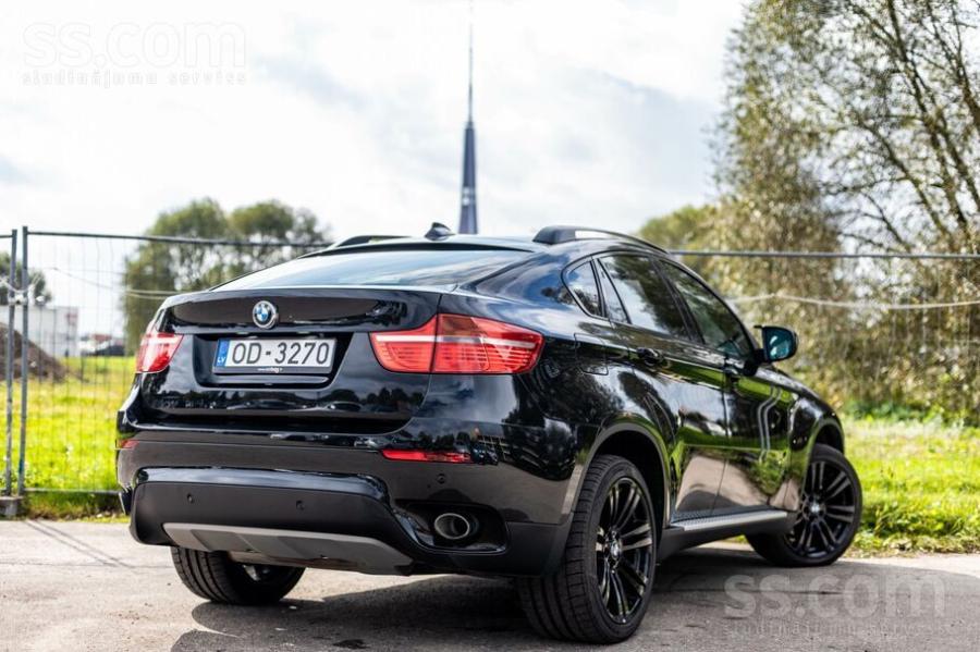 Black BMW X6 2010 in Riga, with an engine capacity of 3.00 L and mileage of 264 thousand km for 14990 €, photo 7 on AUTOMOTO.COM.LV