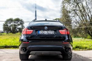 Black BMW X6 2010 in Riga, with an engine capacity of 3.00 L and mileage of 264 thousand km for 14990 €, photo 8 on AUTOMOTO.COM.LV