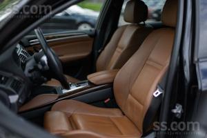 Black BMW X6 2010 in Riga, with an engine capacity of 3.00 L and mileage of 264 thousand km for 14990 €, photo 11 on AUTOMOTO.COM.LV