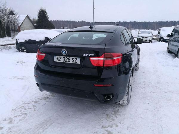 Black BMW X6 2010 in Taurage, with an engine capacity of 2.99 L and mileage of 310 thousand km for 9900 €, photo 7 on AUTOMOTO.COM.LV