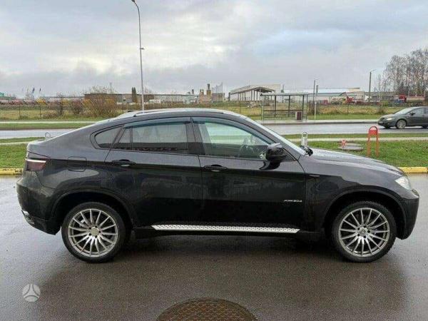 Black BMW X6 2010 in Kretinga, with an engine capacity of 2.99 L and mileage of 319 thousand km for 13000 €, photo 8 on AUTOMOTO.COM.LV