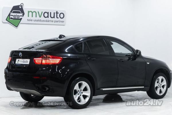 Black BMW X6 2010 in Tallinn, with an engine capacity of 3.00 L and mileage of 303 thousand km for 12990 €, photo 2 on AUTOMOTO.COM.LV