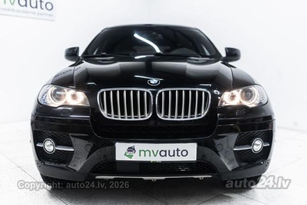 Black BMW X6 2010 in Tallinn, with an engine capacity of 3.00 L and mileage of 303 thousand km for 12990 €, photo 4 on AUTOMOTO.COM.LV